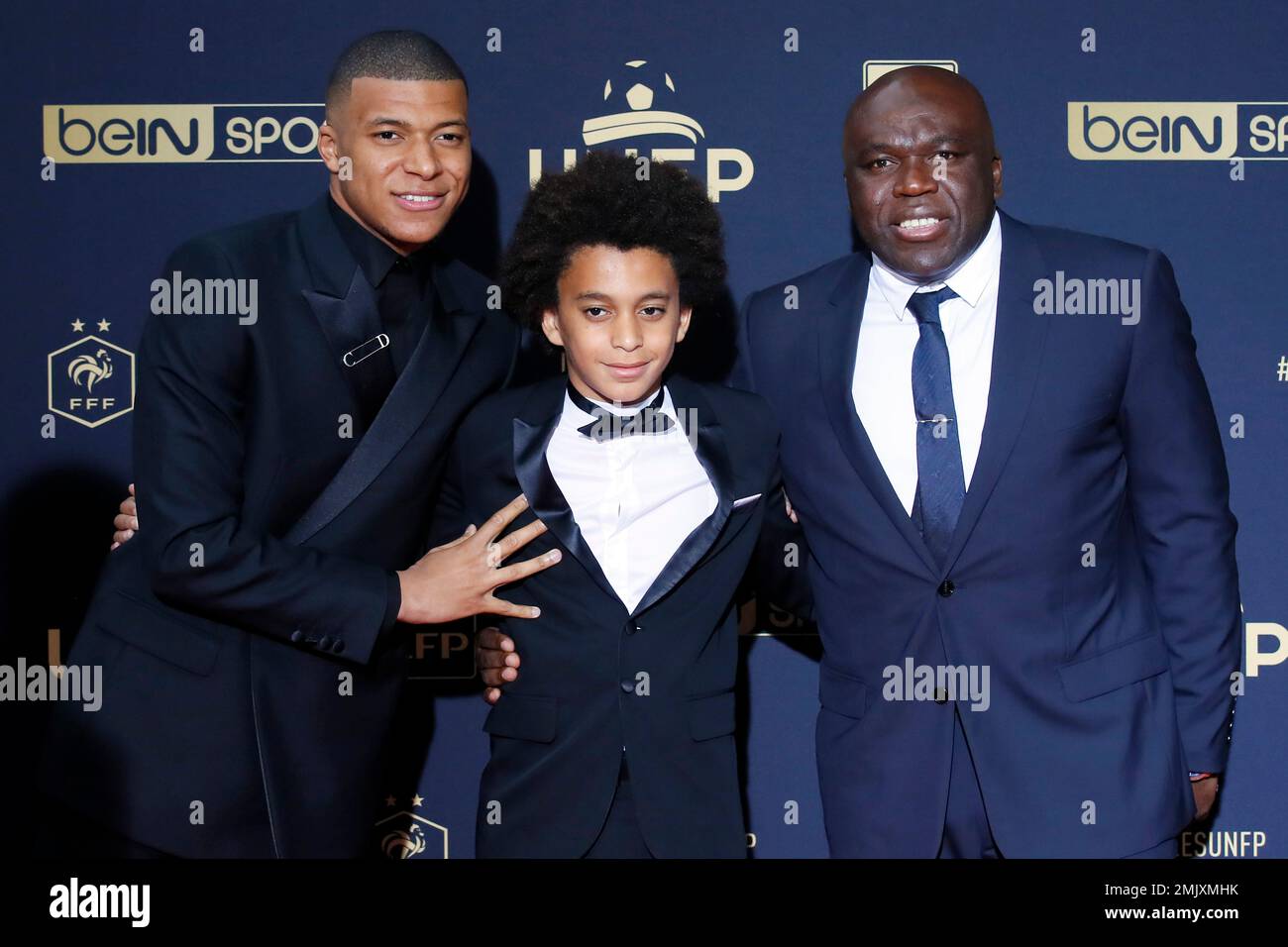 Paris Saint Germain's Kylian Mbappe, with his brother Ethan and his ...