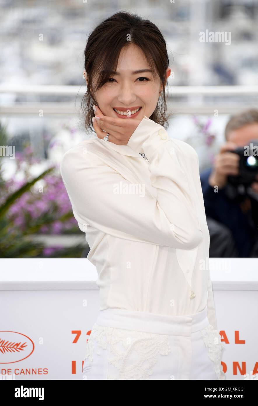 Actress Wan Qian poses for photographers at the photo call for the film ...