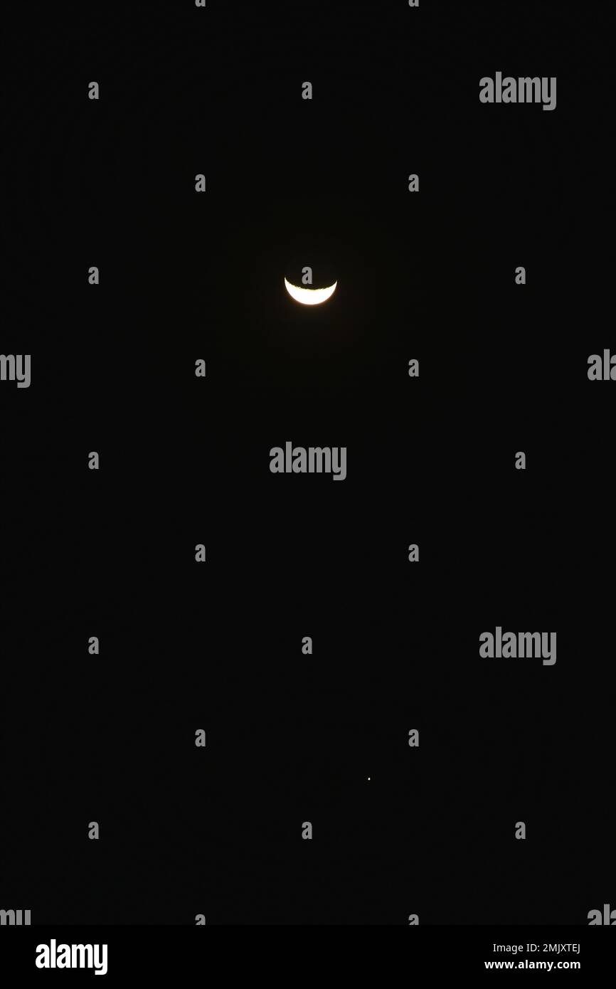 half moon and Venus arranging on sky in night Stock Photo - Alamy
