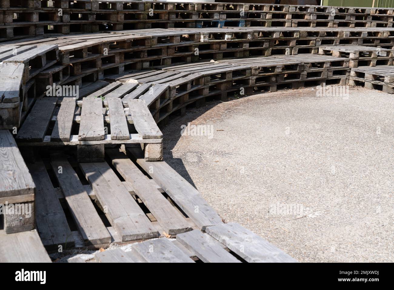 Wooden seats amphitheater wood pallets stage Stock Photo - Alamy