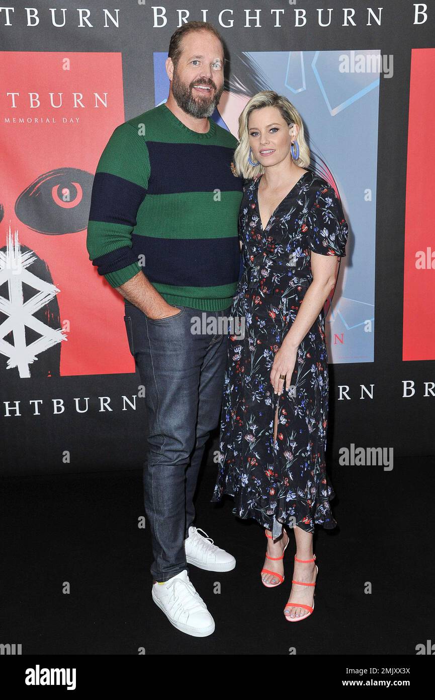 David Denman, left, and Elizabeth Banks attend a photo call for ...