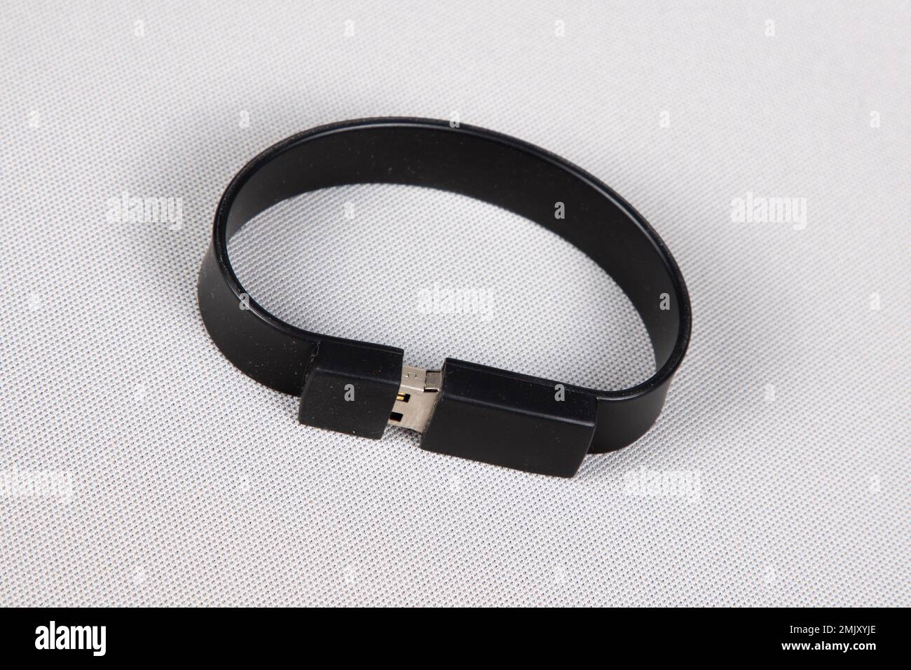 USB flash drive memory set key in bracelet on a white background Stock ...