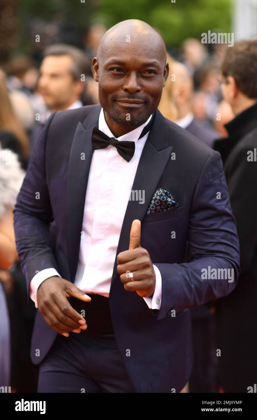 Actor Jimmy Jean-Louis poses for photographers upon arrival at the ...
