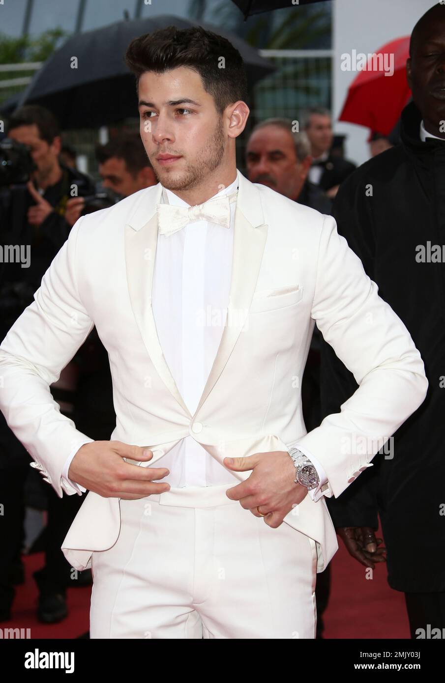 Singer Nick Jonas poses for photographers upon arrival at the premiere ...