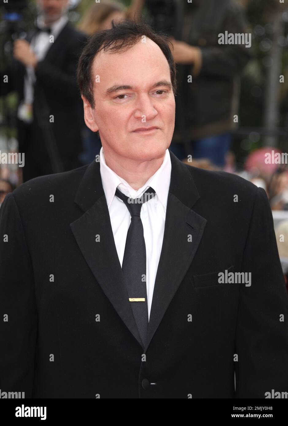 Film director Quentin Tarantino poses for photographers upon arrival at ...