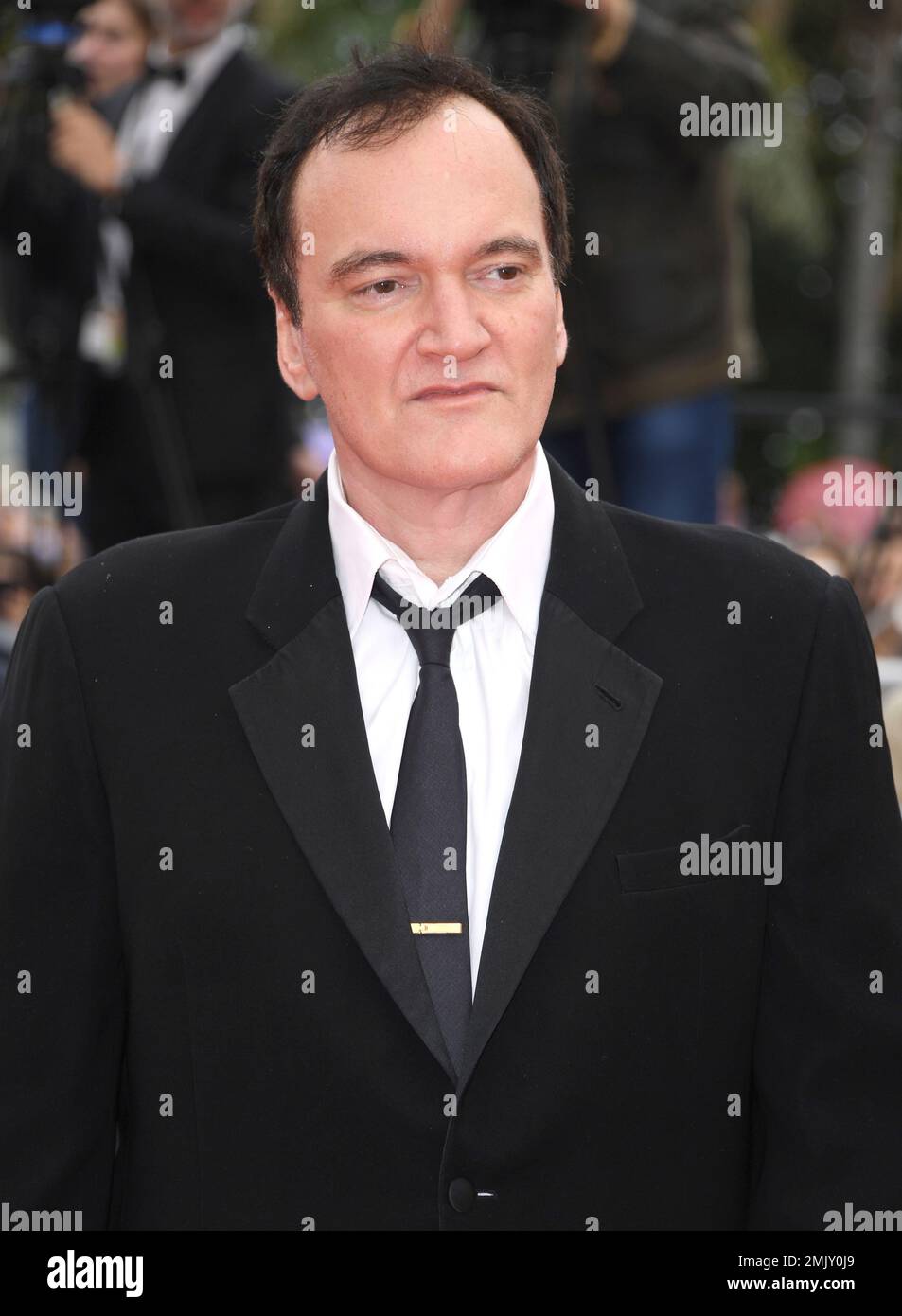 Film director Quentin Tarantino poses for photographers upon arrival at ...