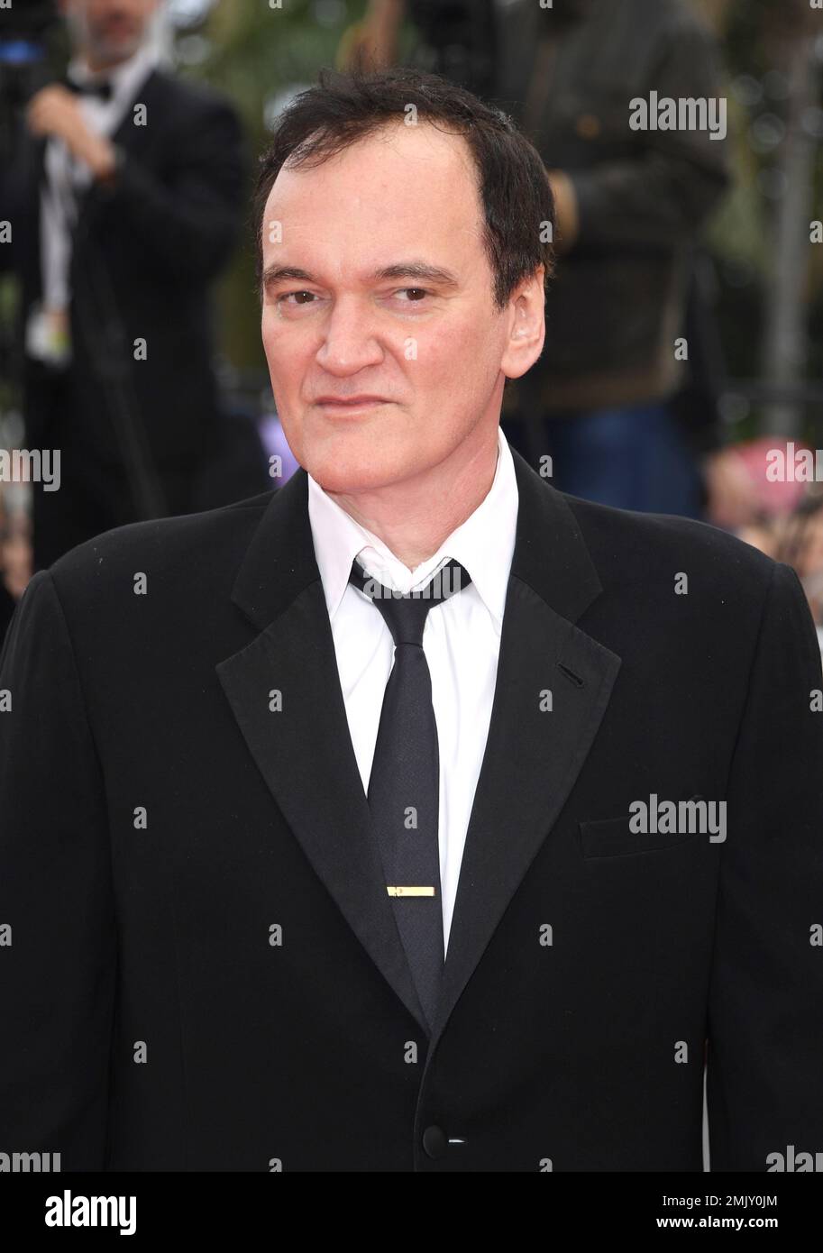 Film director Quentin Tarantino poses for photographers upon arrival at ...