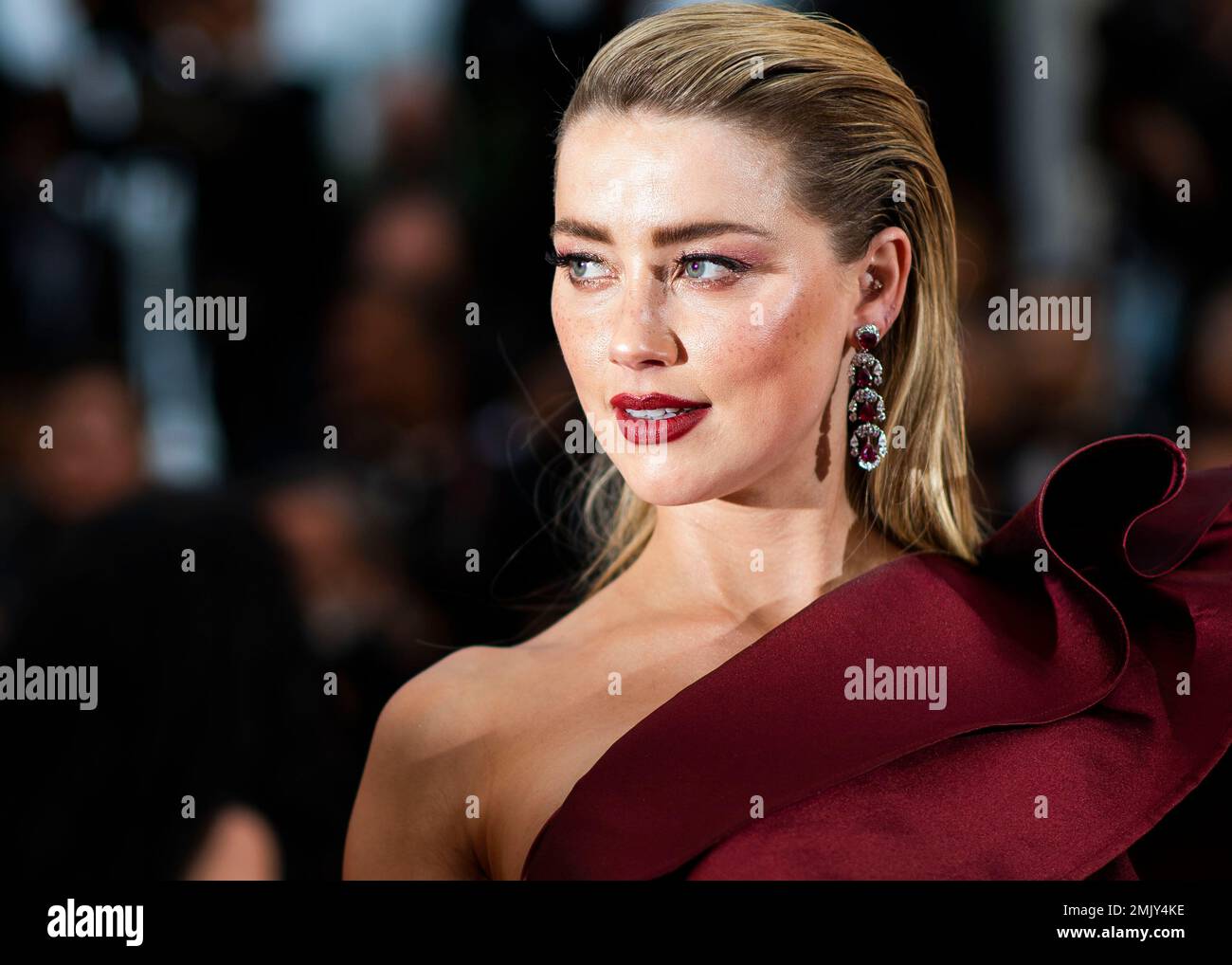 Actress Amber Heard poses for photographers upon arrival at the ...