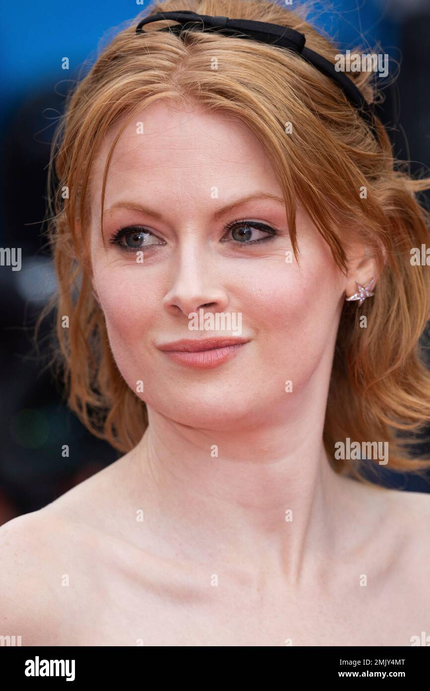 Actress Emily Beecham poses for photographers upon arrival at the ...