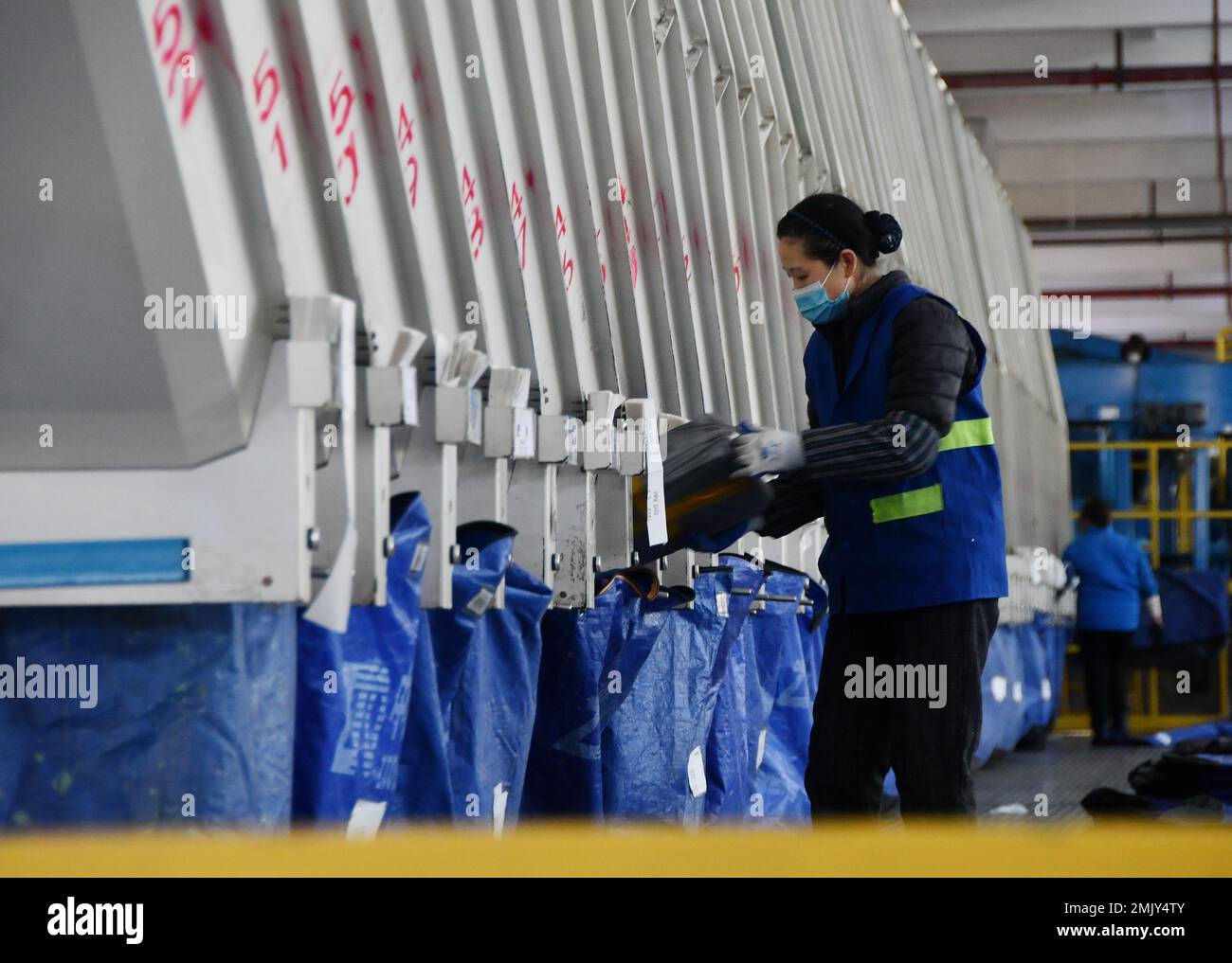 HANDAN, CHINA - JANUARY 21, 2023 - Workers sort express deliveries at ...
