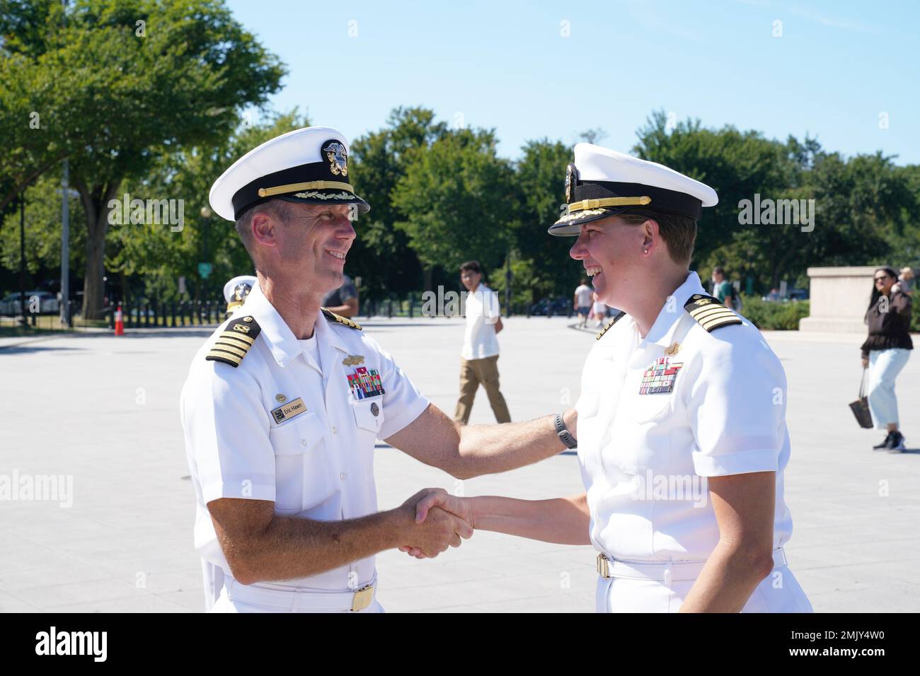 Capt. Eric Hawn acknowledges Capt. Juliana Strieter during her ...