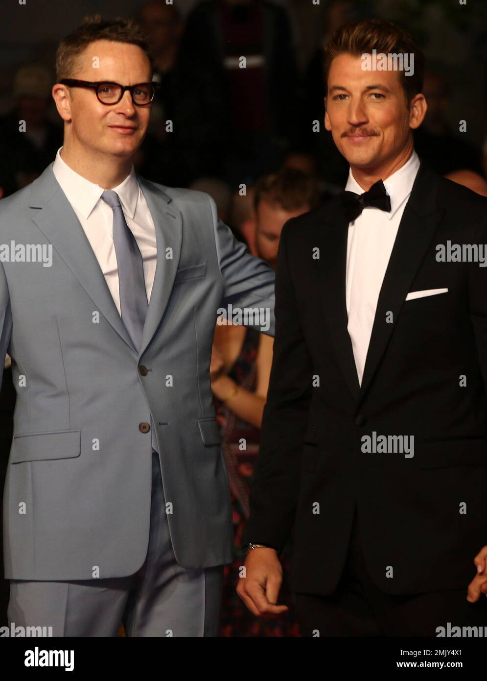 Director Nicolas Winding Refn, left, and actor Miles Teller pose for ...