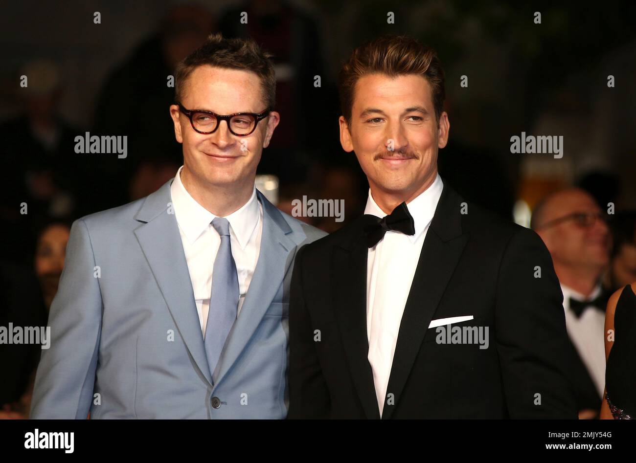 Actor Miles Teller, left, and director Nicolas Winding Refn pose for ...