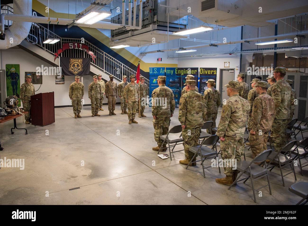 U.S. Army divers of the 511th Engineer Dive Detachment stand in position during closing of a pre ...