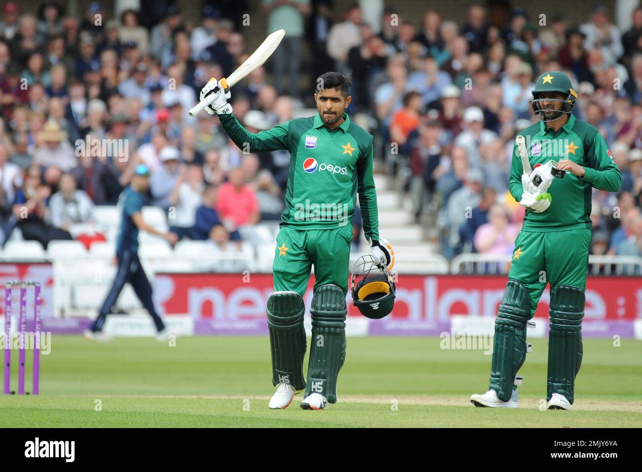 Pakistan's Babar Azam celebrates scoring a century during the Fourth ...