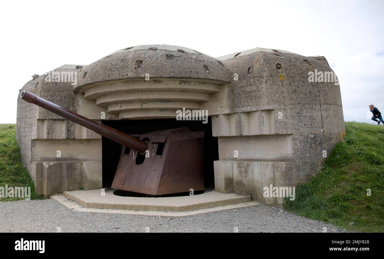 A German World War II artillery battery sits on a hill in Longues-sur ...