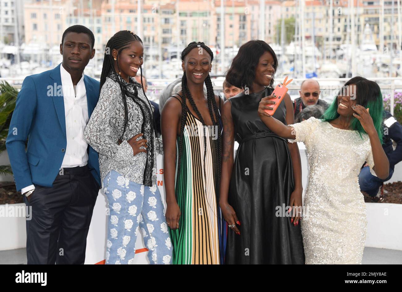 Actors Amadou Mbow, from left, Mame Sane, Aminata Kane, Nicole Sougou ...