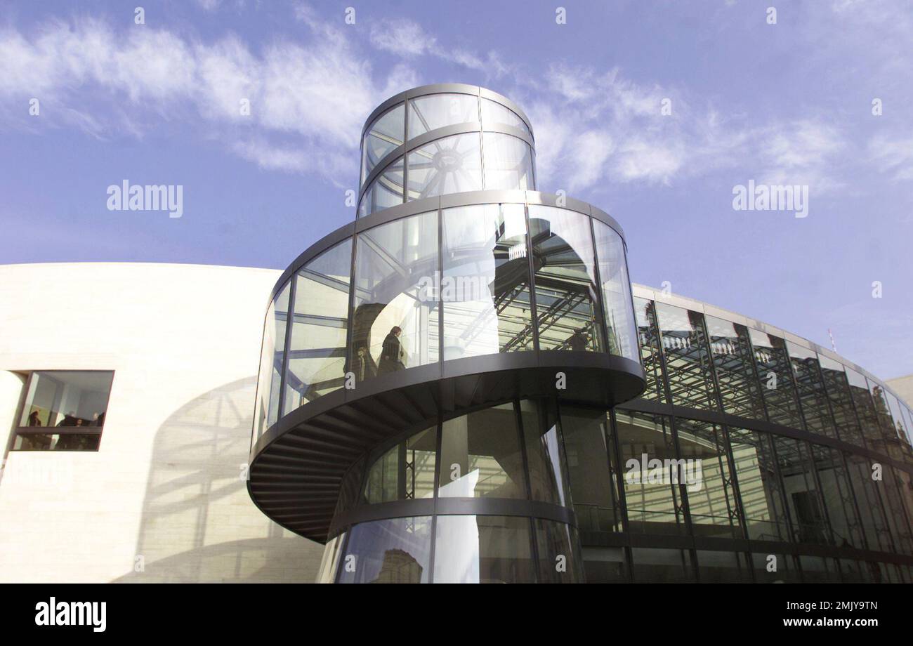 FILE - In this Friday, Feb. 28, 2003, file photo, a woman walks up the ...