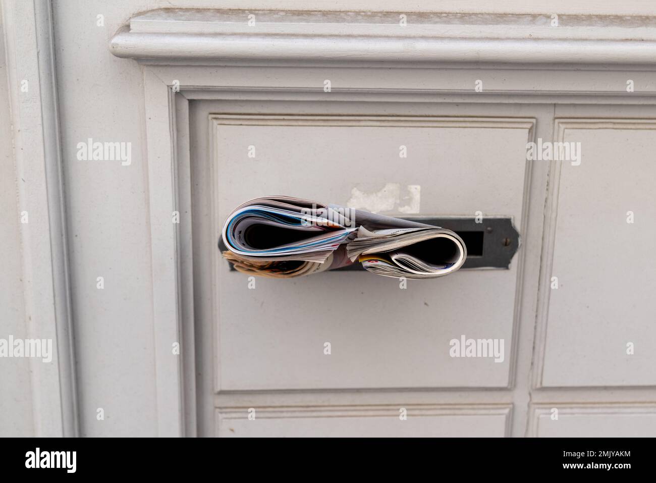 Many leaflets in mailbox filled with spam advertising paper Stock Photo ...