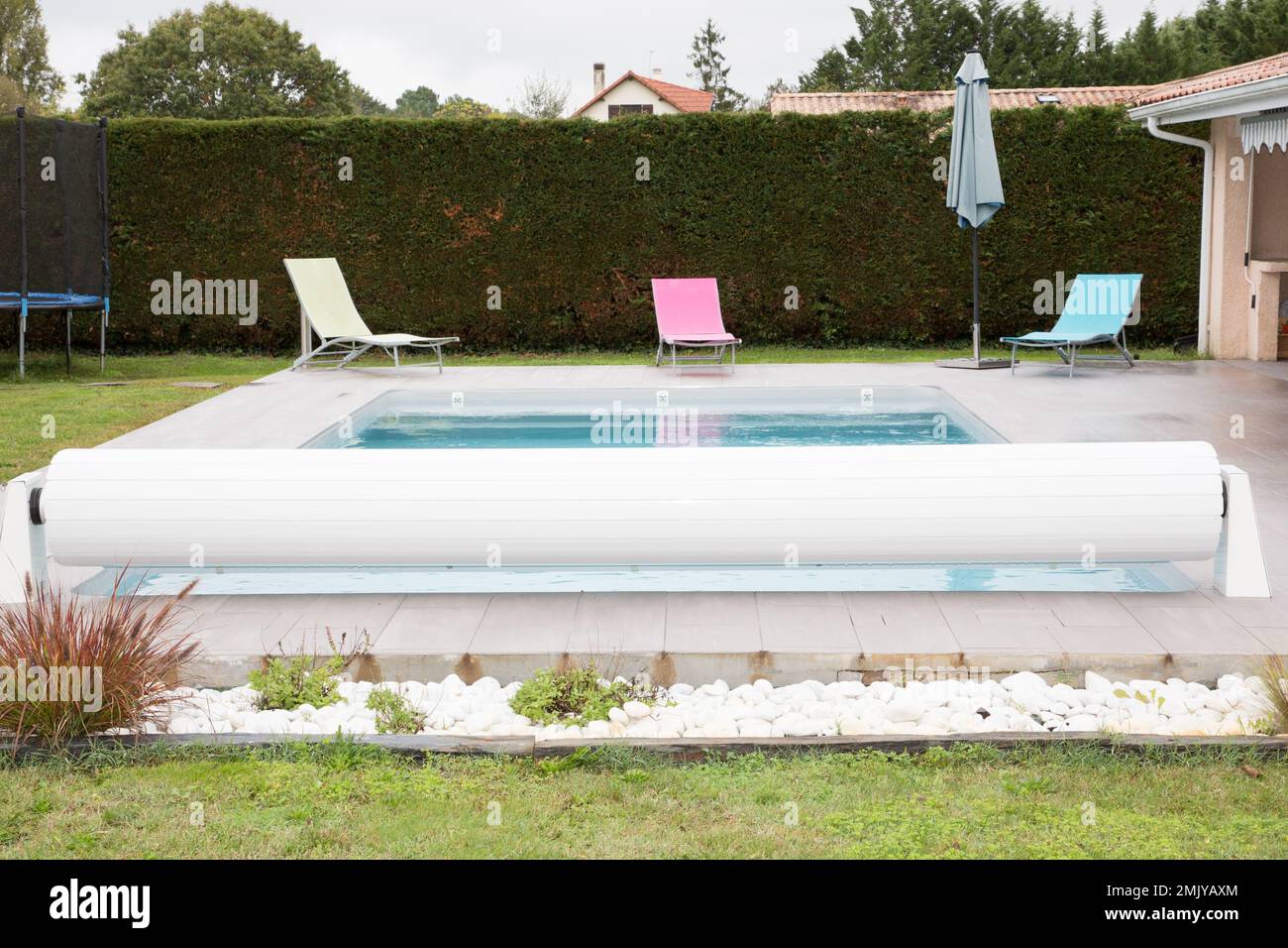 Retractable pool cover hi-res stock photography and images - Alamy