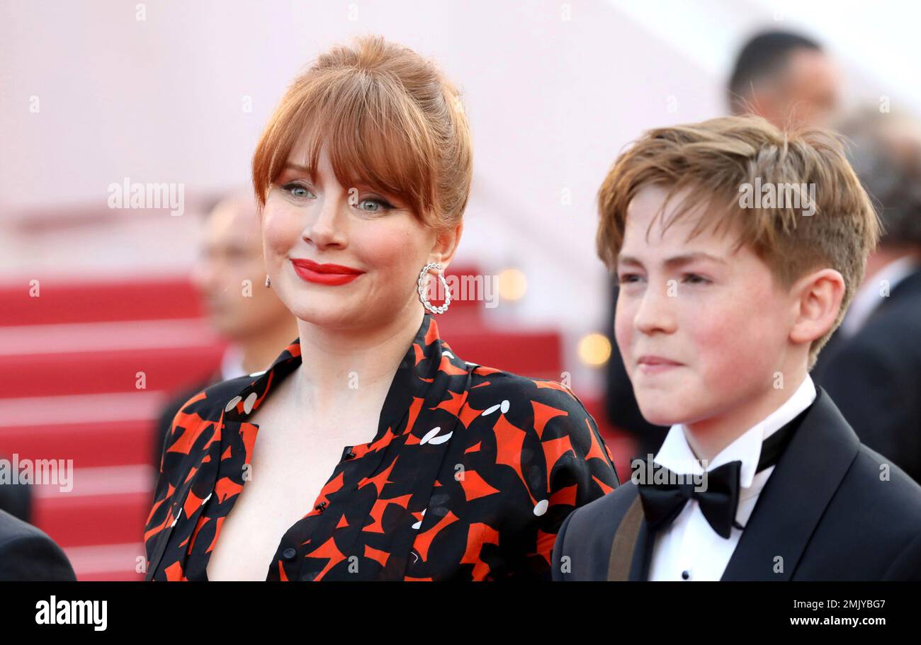 Actors Bryce Dallas Howard, left, and Kit Connor pose for photographers ...