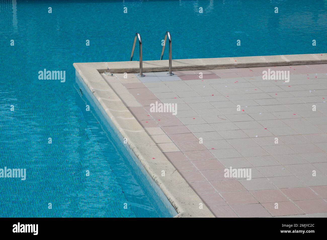 Metal swimming pool ladder in detail corner Stock Photo - Alamy