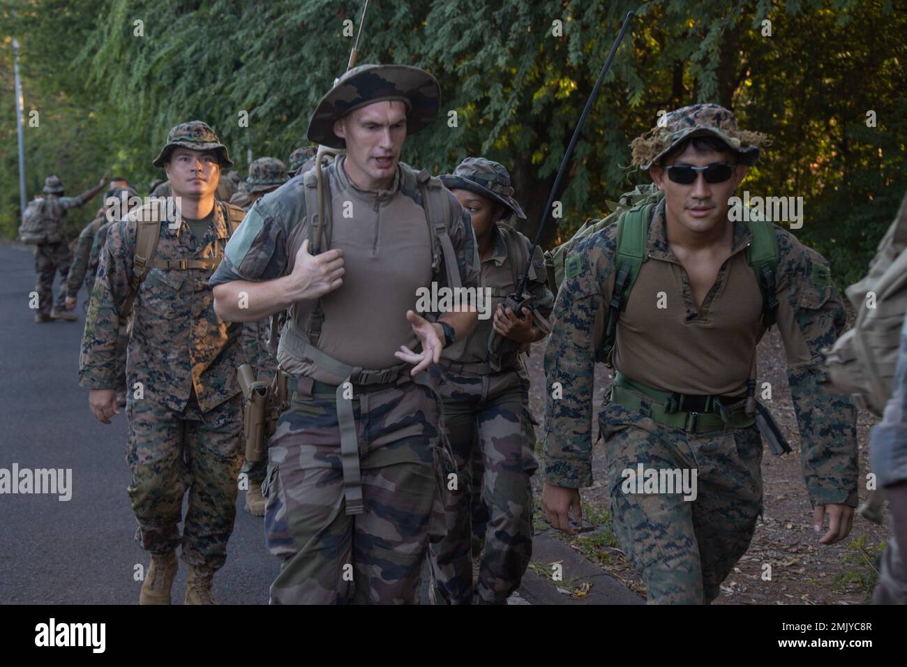 U.S. Marine Corps Capt. Daniel W. Chow, right, company commander ...