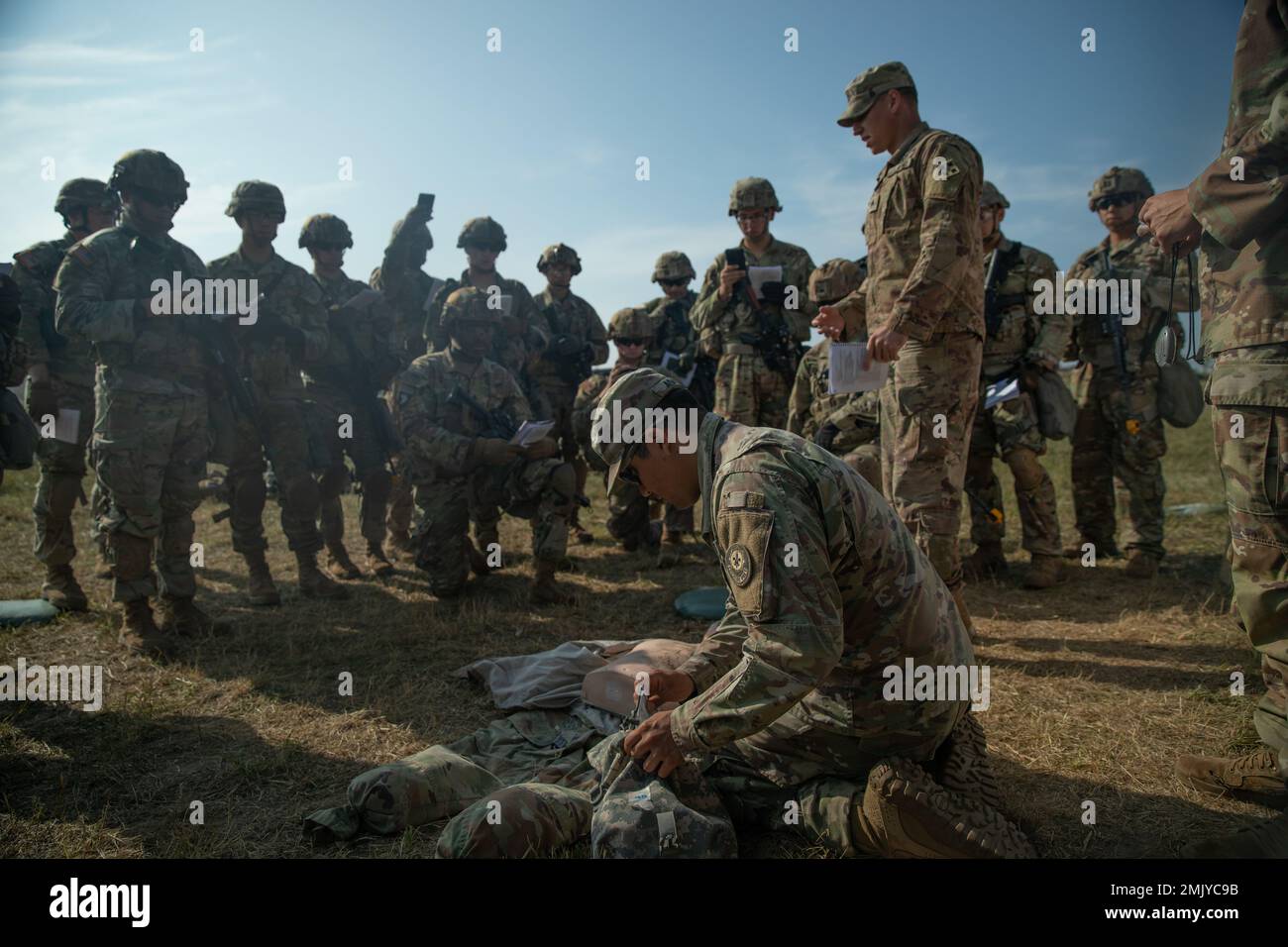 U.S. Soldiers receive instructions at the medical lane to earn the U.S ...