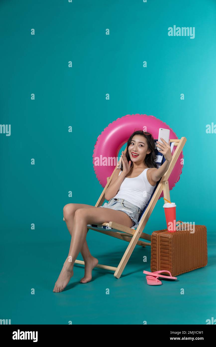 Take summer modelling young woman Stock Photo - Alamy