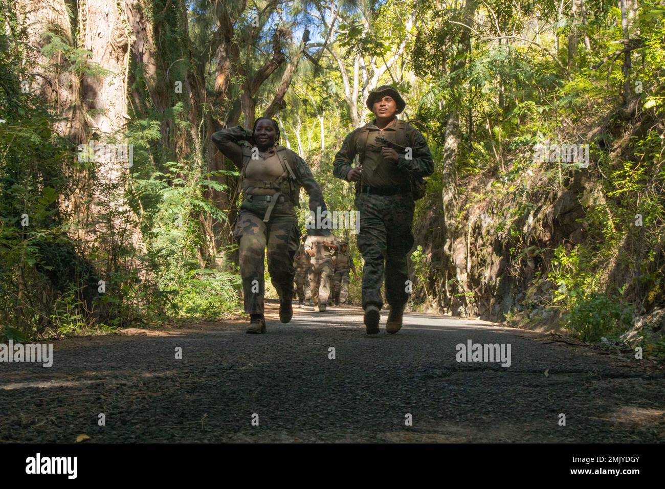 U.S. Marine Corps Cpl. Leonardo Macedo Jr., right, accounting chief ...