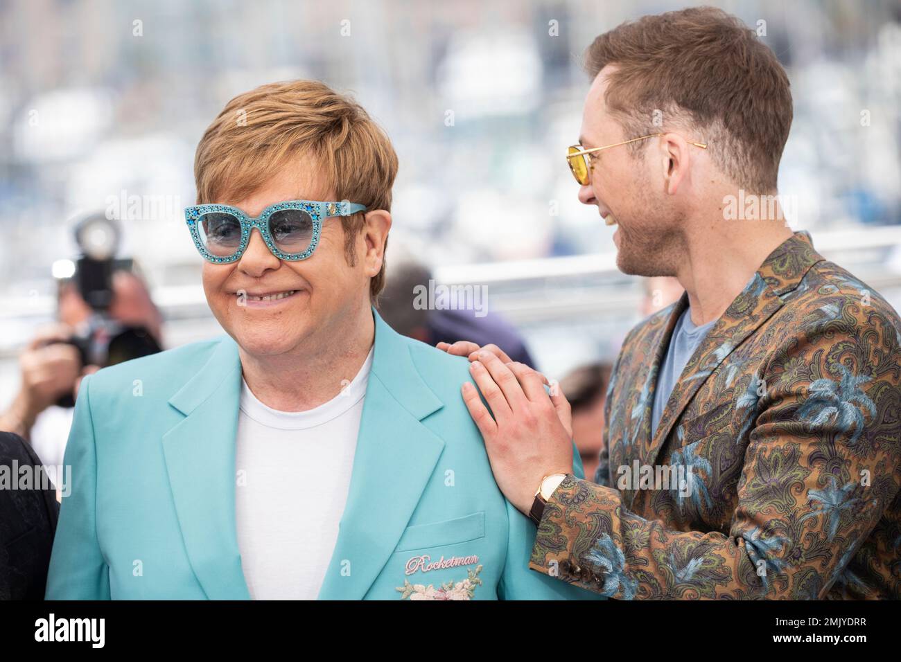 Singer Elton John and actor Taron Egerton pose for photographers at the ...