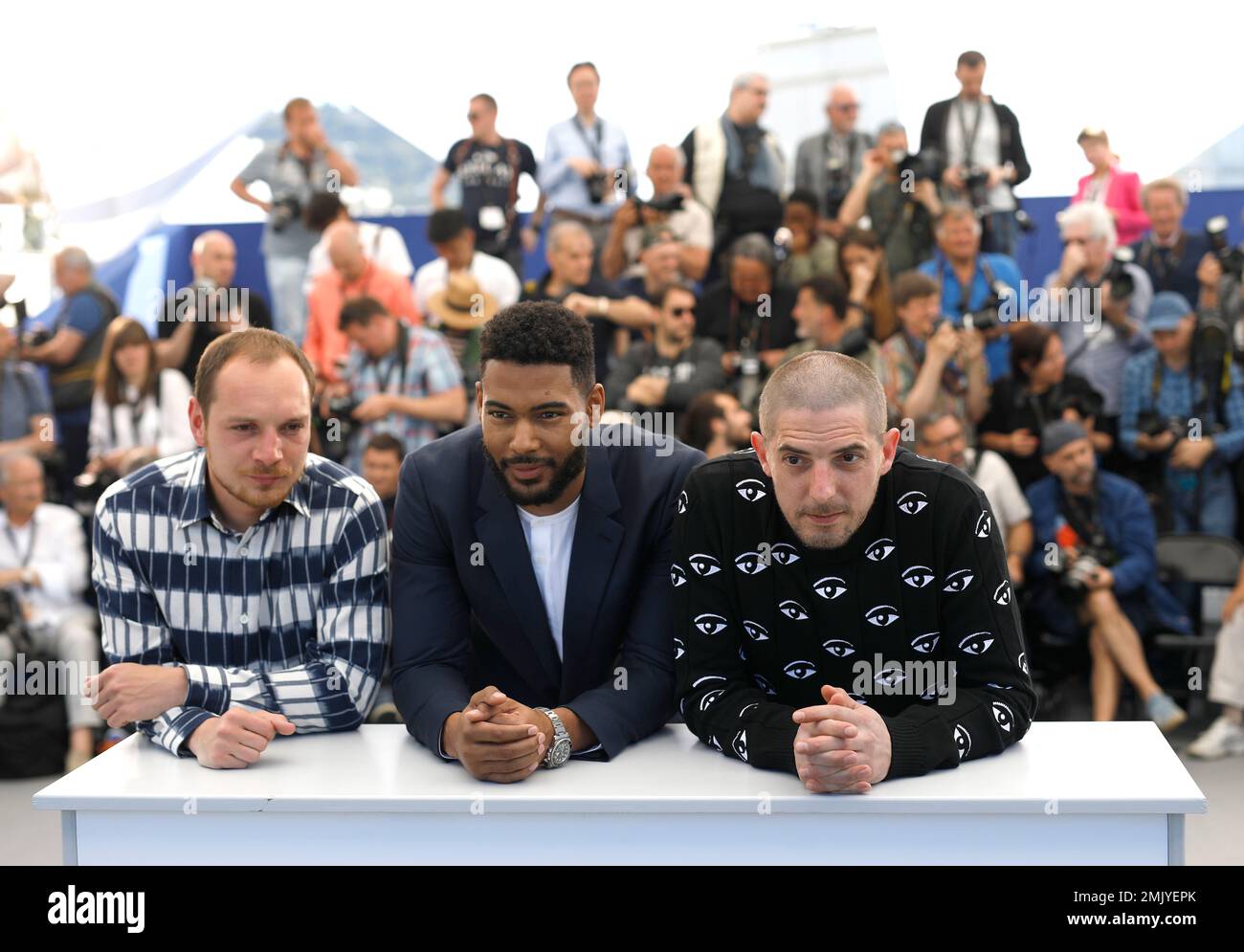 Actors Alexis Manenti, from left, Djebril Zonga and Damien Bonnard pose ...