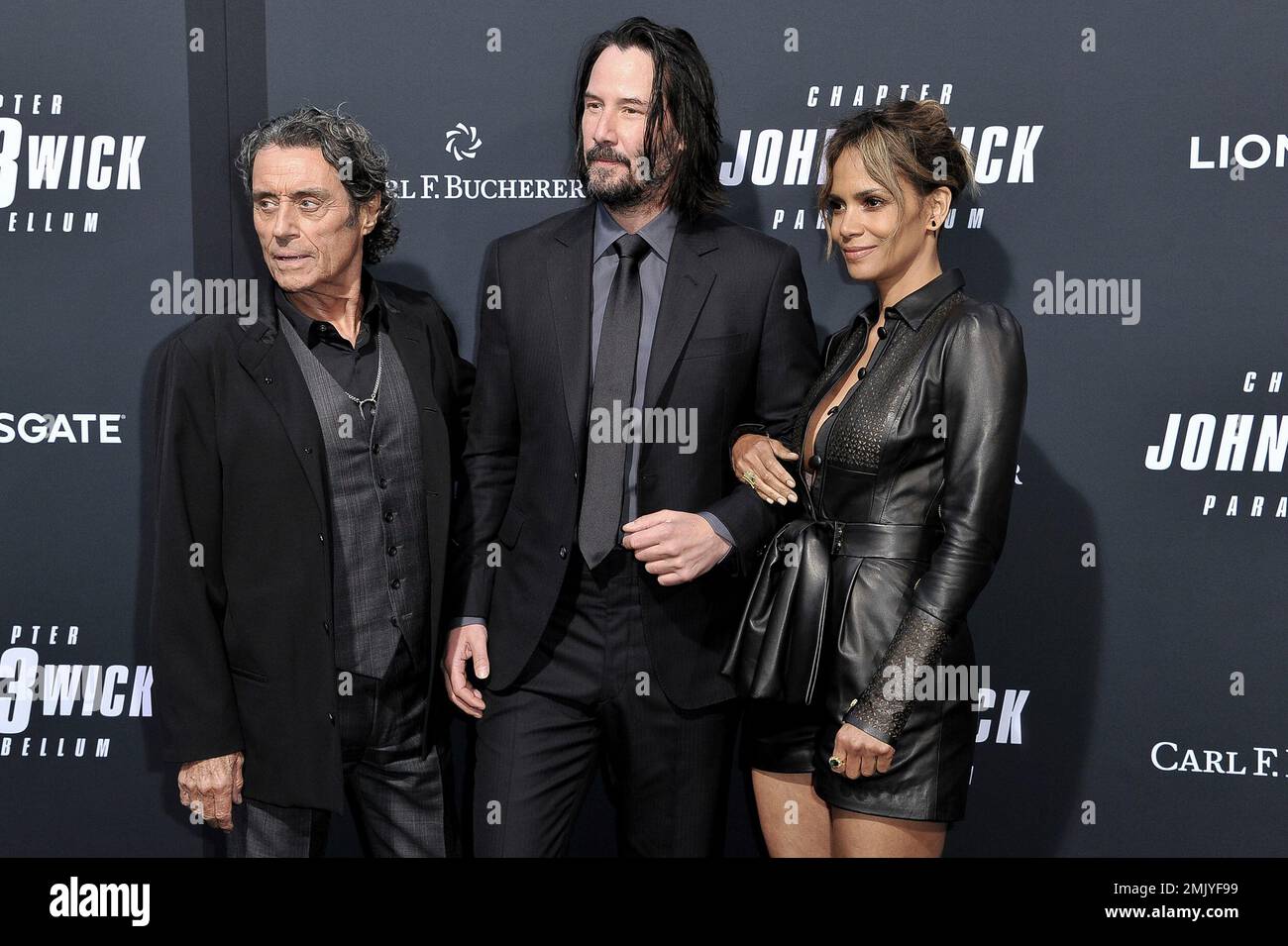Ian McShane, from left, Keanu Reeves and Halle Berry attend a special ...