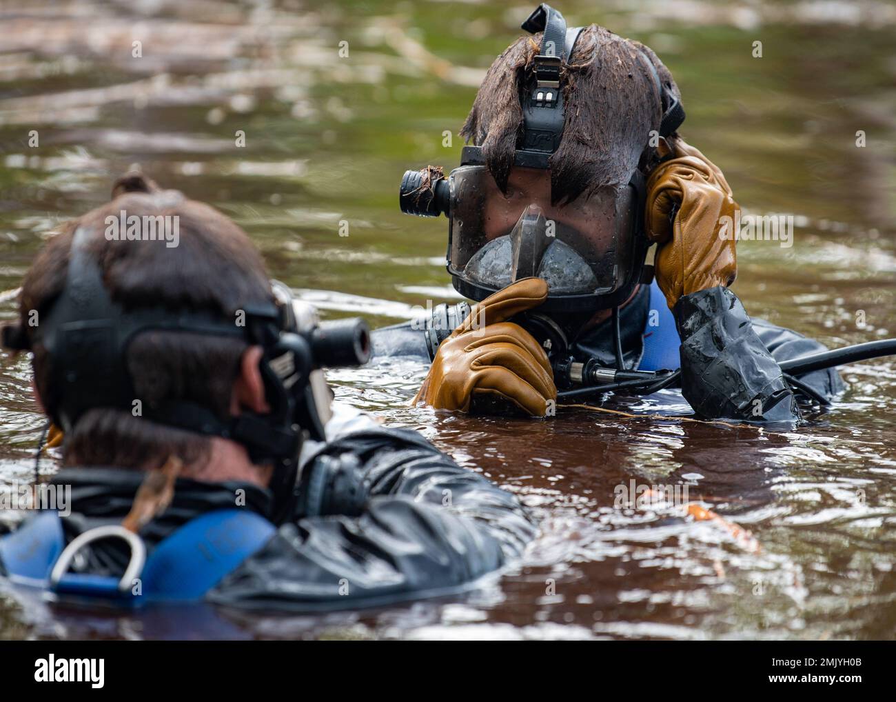 U.S. Navy ND2 Seth Davis, a Navy diver assigned to the Defense POW/MIA ...