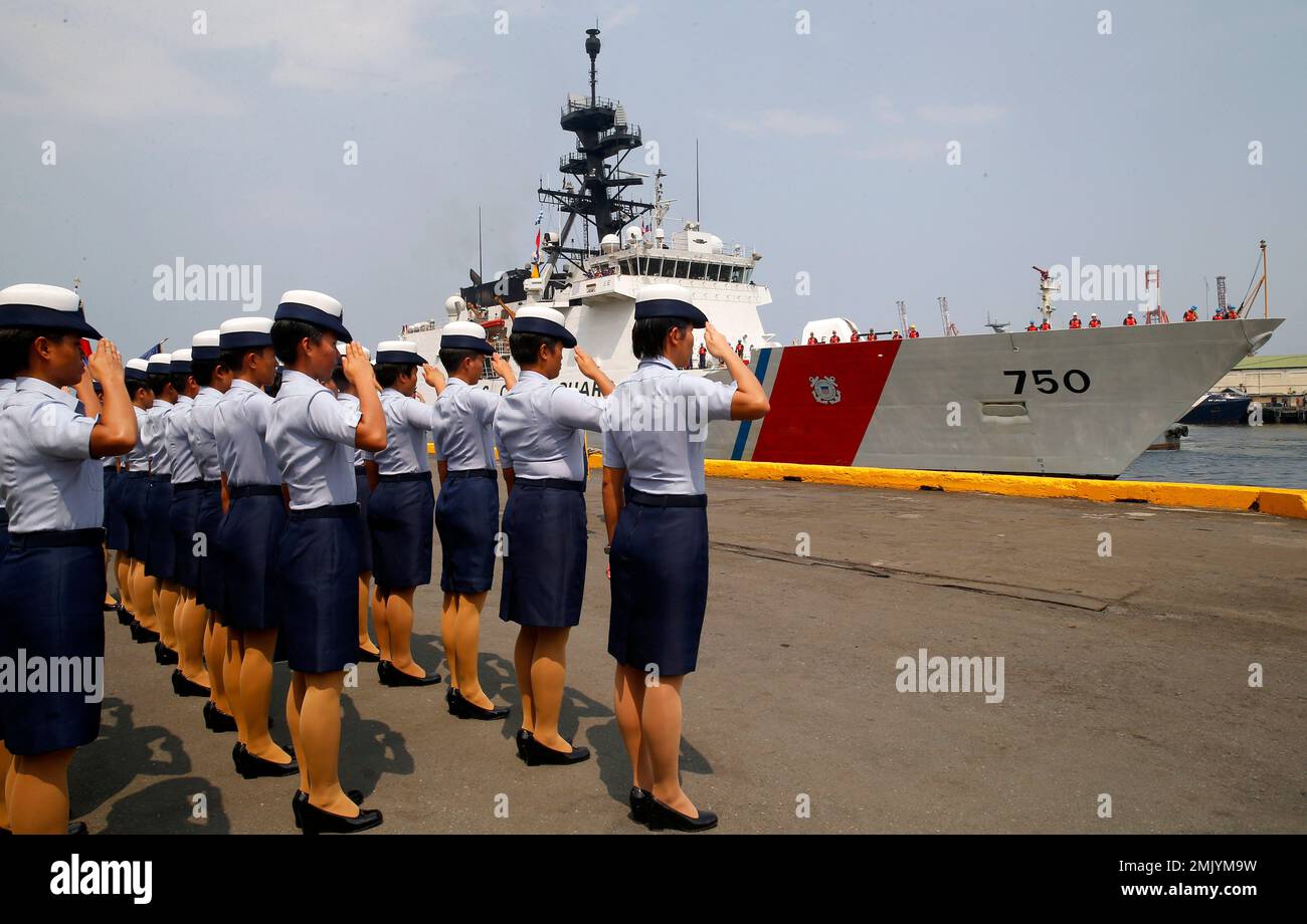Philippine Coast Guard personnel salute to welcome the U.S. Coast Guard ...