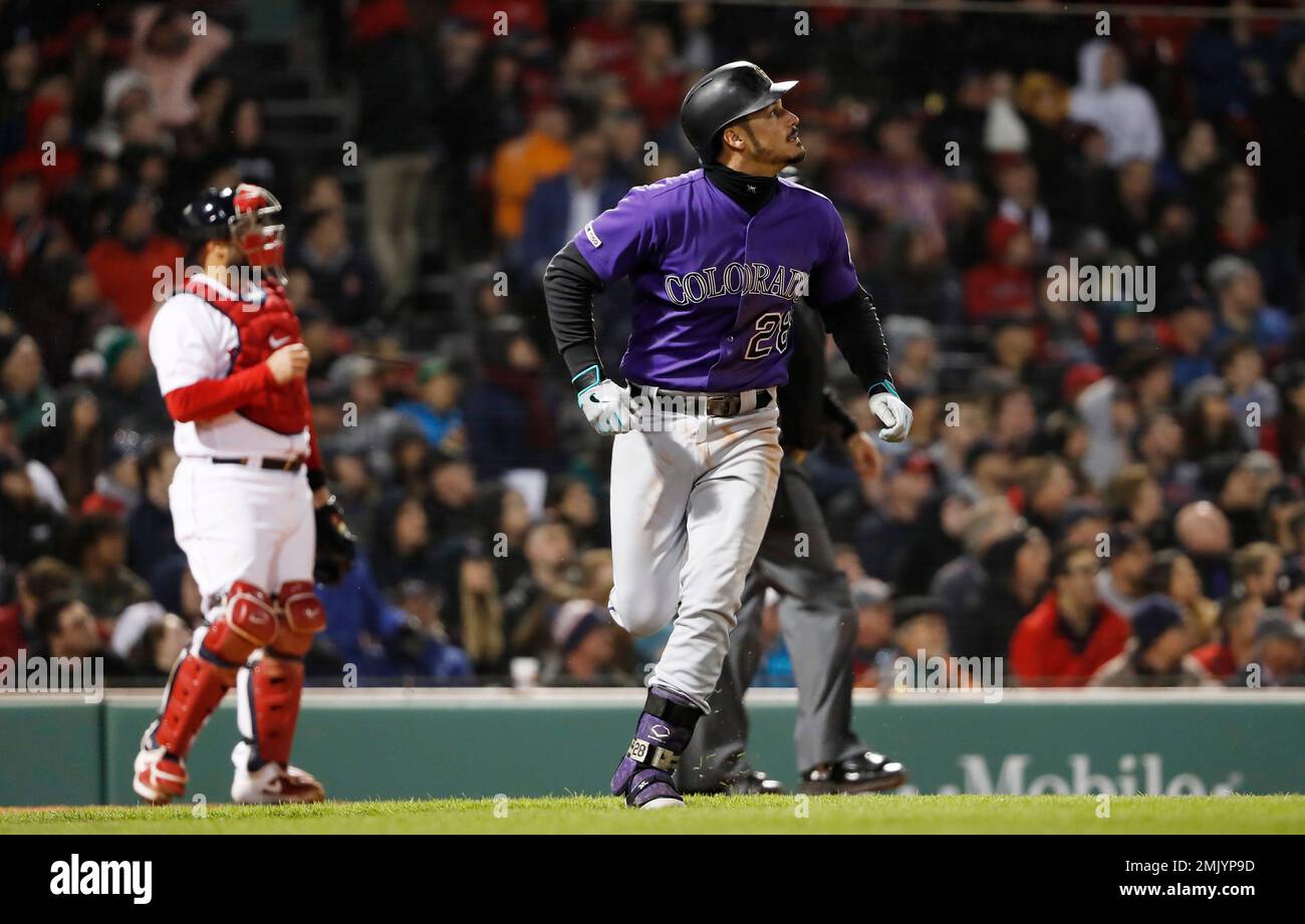 Colorado Rockies' Nolan Arenado watches his two-run home run against ... Colorado Rockies' Nolan Arenado watches his two-run home run against ...