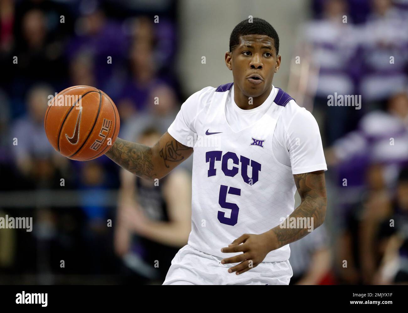 TCU guard Kendric Davis (5) handles the ball during an NCAA college ...