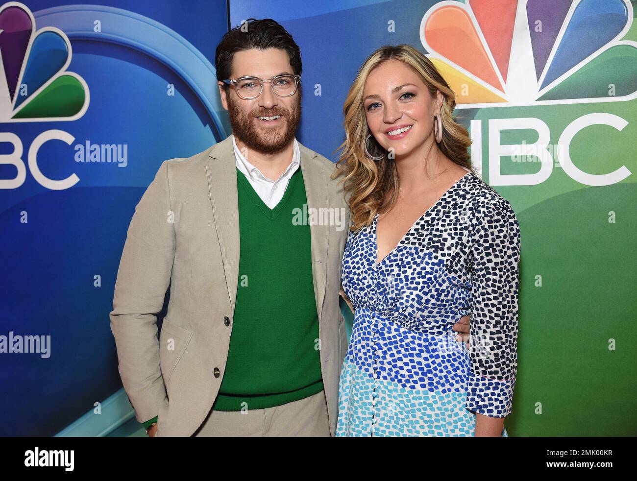 Adam Pally, left, and Abby Elliott, from the cast of "Indebted," attend ...