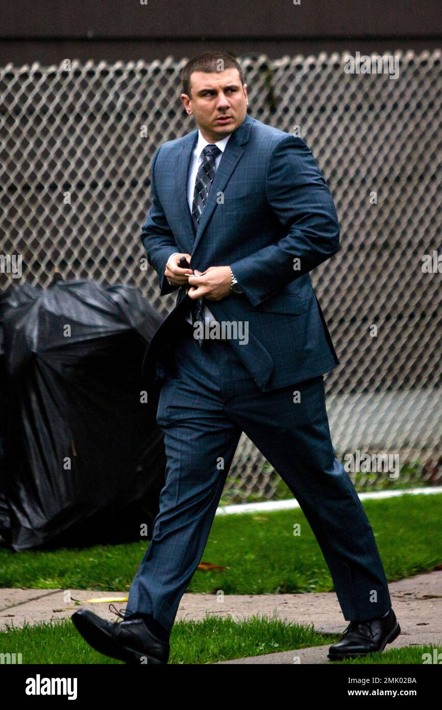 New York City police officer Daniel Pantaleo leaves his house Monday ...