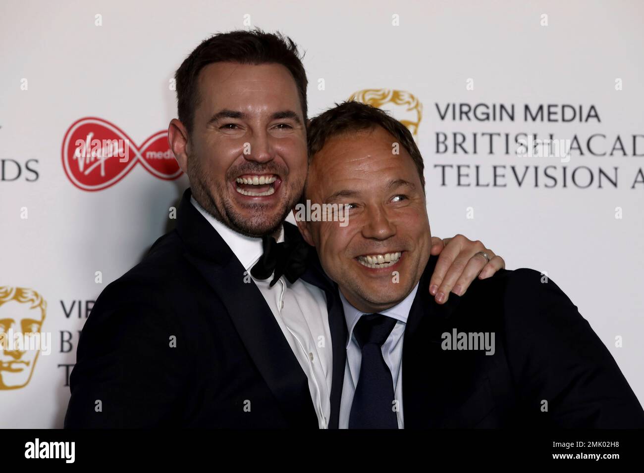 Actors Martin Compston, left, and Stephen Graham pose for photographers ...