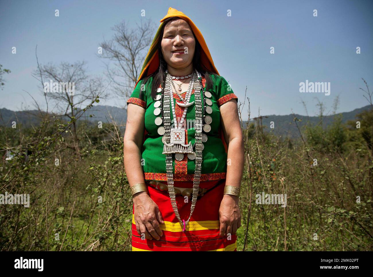 In this Saturday, March 30, 2019, photo, an Adi tribal woman Kargep Yao ...