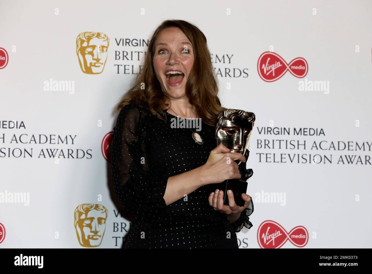 Actress Jessica Hynes poses with her award for 'best female comedy ...