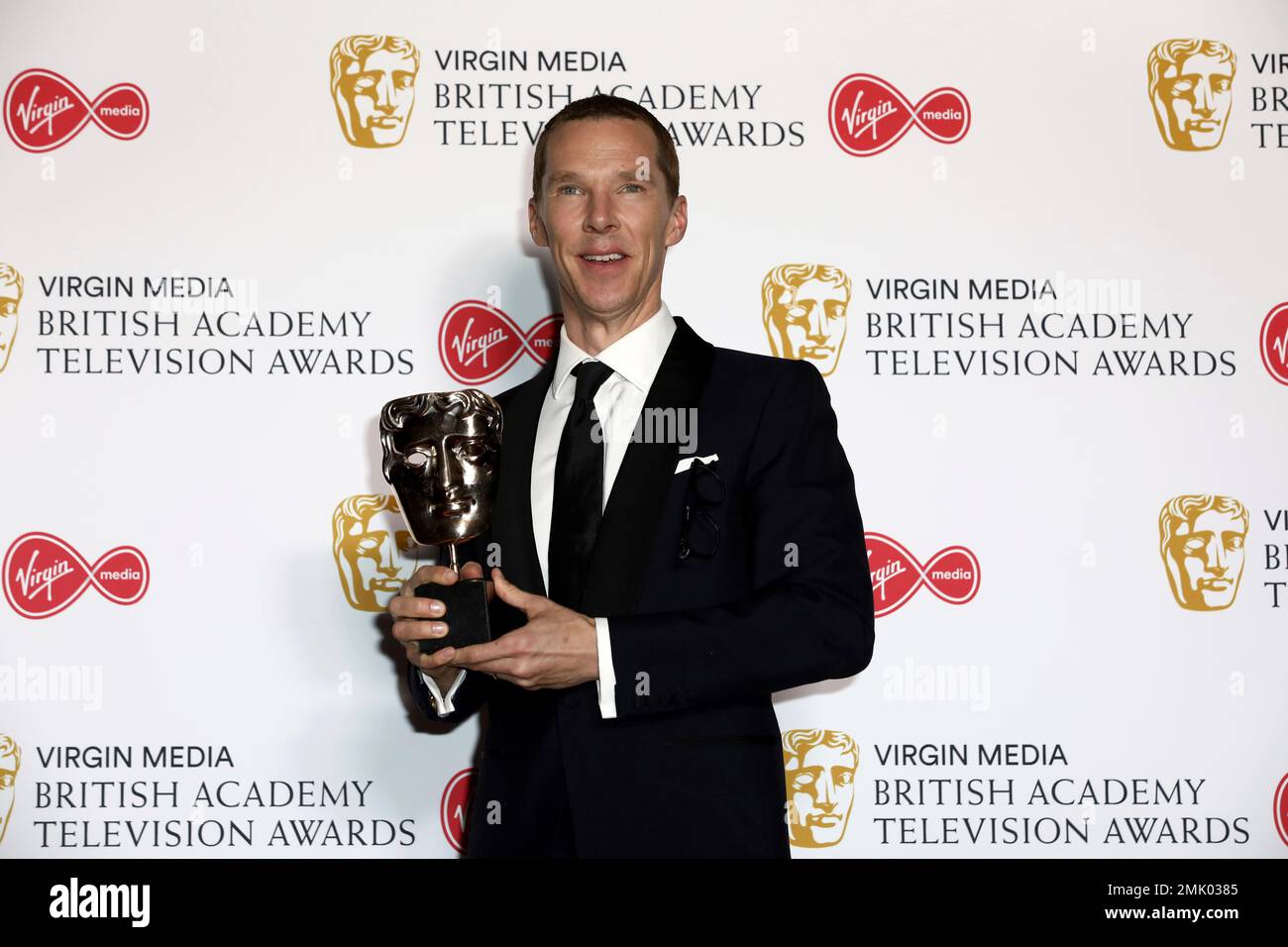 Actor Benedict Cumberbatch poses for photographers after winning the ...