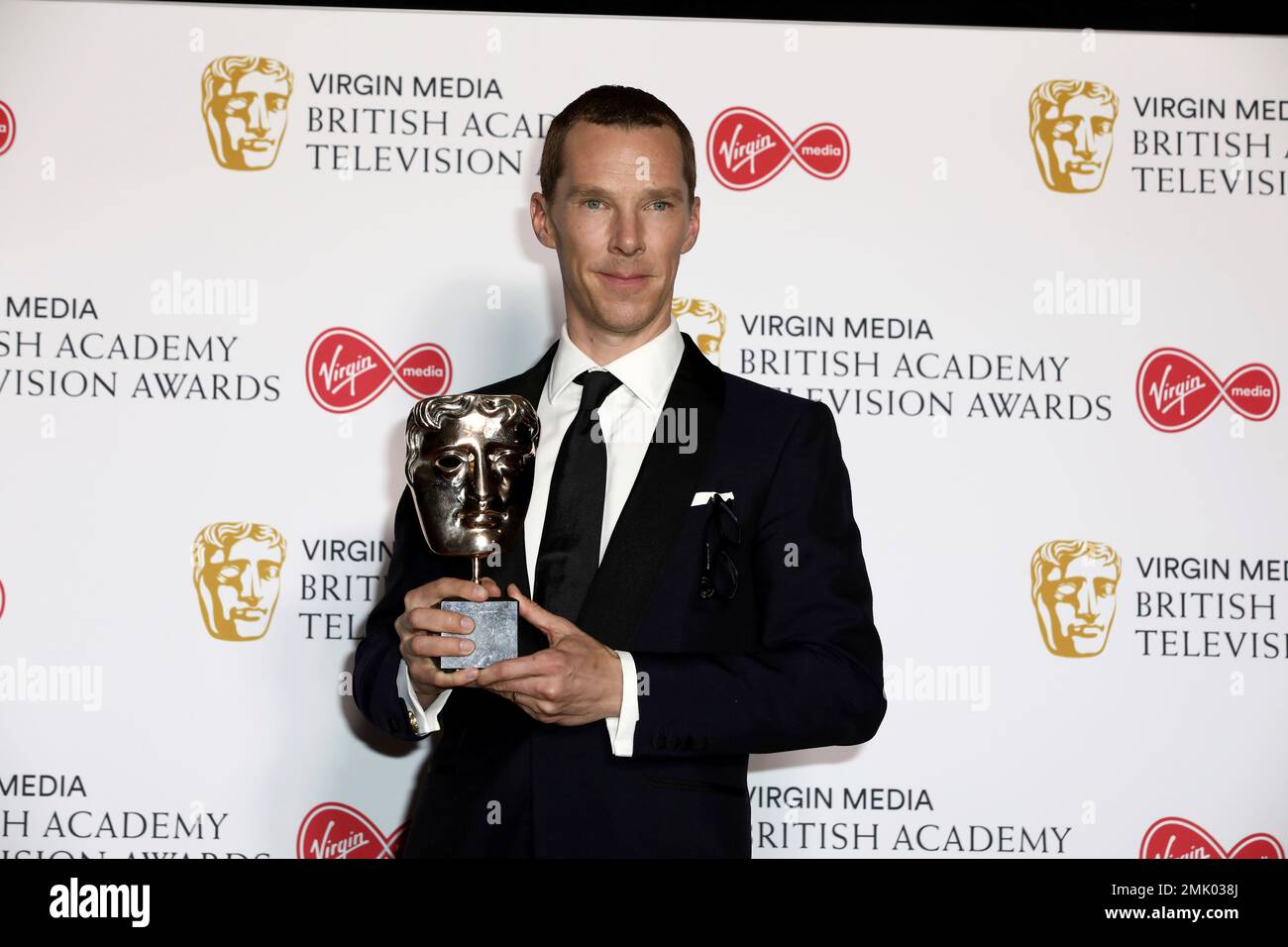 Actor Benedict Cumberbatch poses for photographers after winning the ...