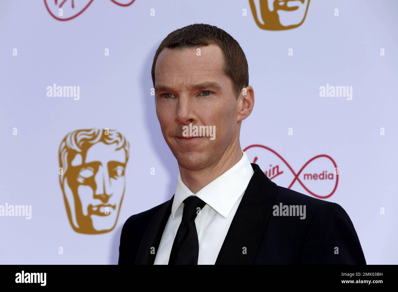 Actor Benedict Cumberbatch poses for photographers on arrival at the ...
