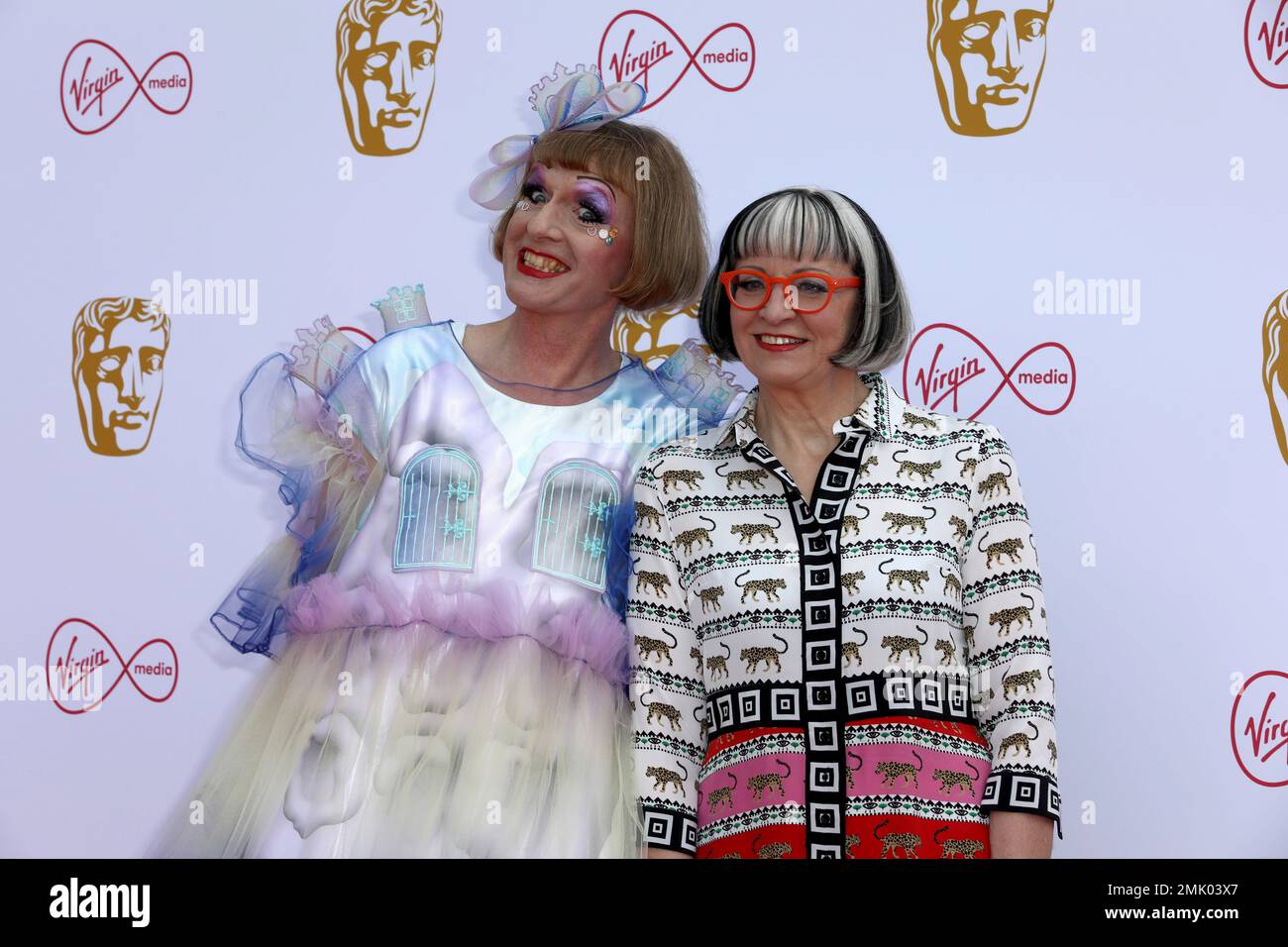 Artist Grayson Perry, and partner Philippa Perry pose for photographers ...