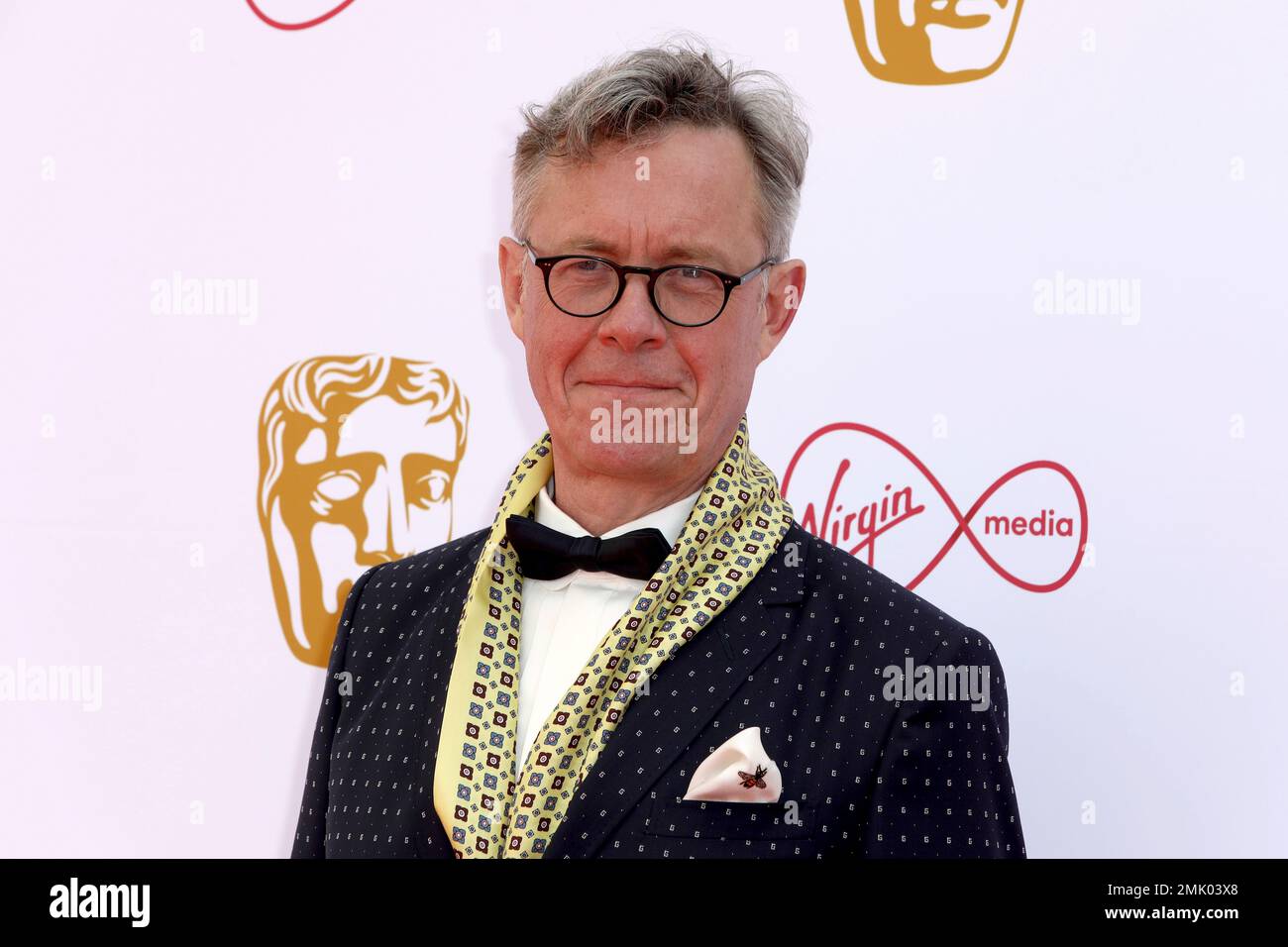 Actor Alex Jennings poses for photographers on arrival at the 2019 ...