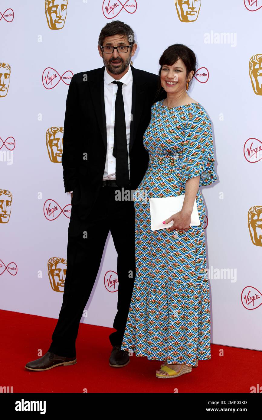 Documentary film-maker Louis Theroux and partner Nancy Strang pose for ...