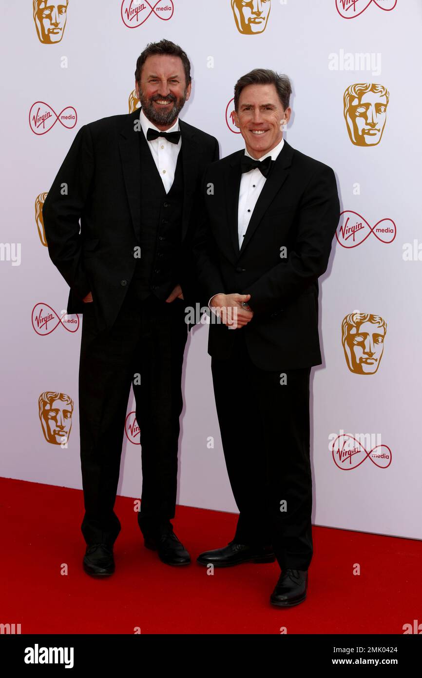 Comedians Lee Mack, left, and Rob Brydon pose for photographers on ...