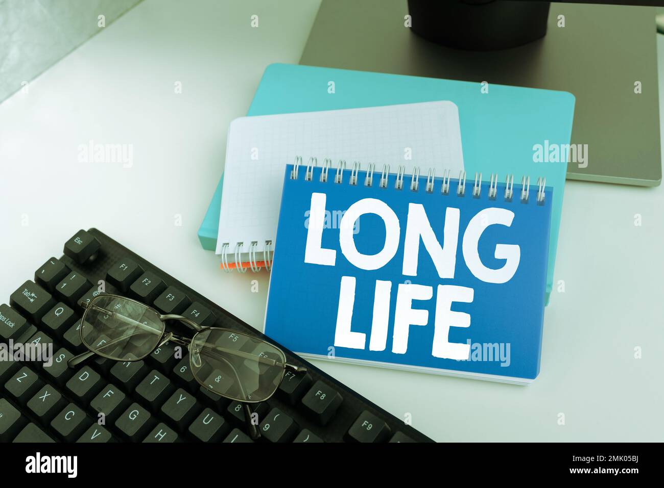 Hand writing sign Long Life. Conceptual photo able to continue working ...